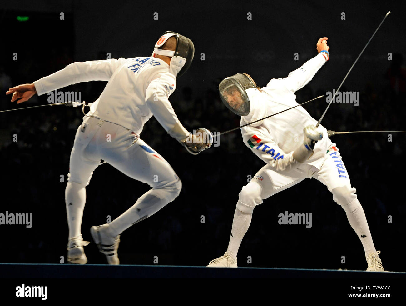 Italian fencer Matteo Tagliariol (R) in action against France's Fabrice ...