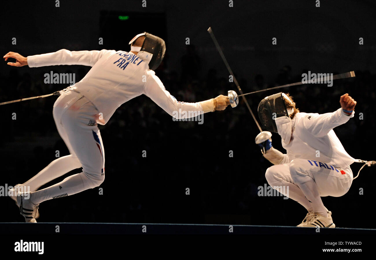 Italian fencer Matteo Tagliariol (R) in action against France's Fabrice ...