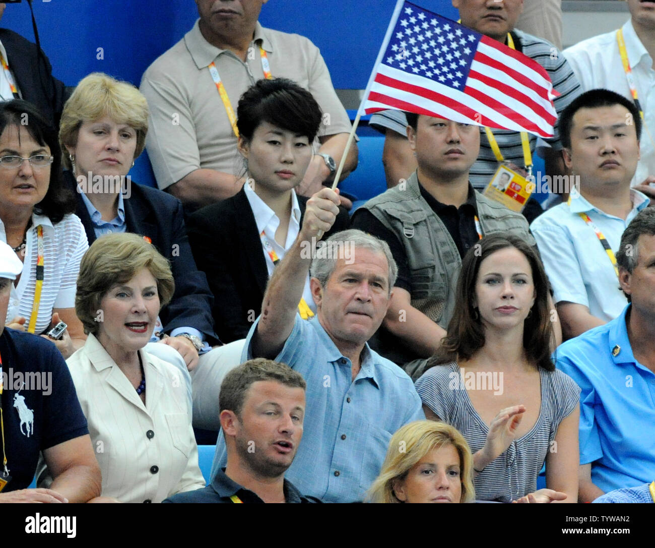 United States President George W. Bush waves the American flag as he ...