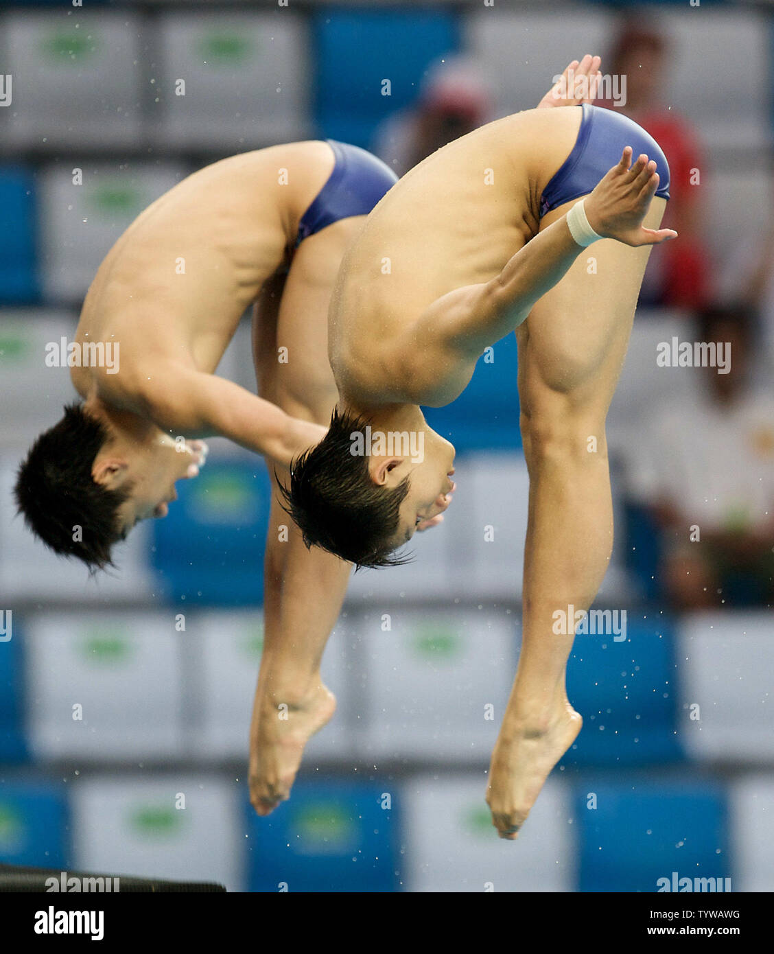 Chinese divers Lin Yue and Huo Liang compete during the Olympic Men's ...