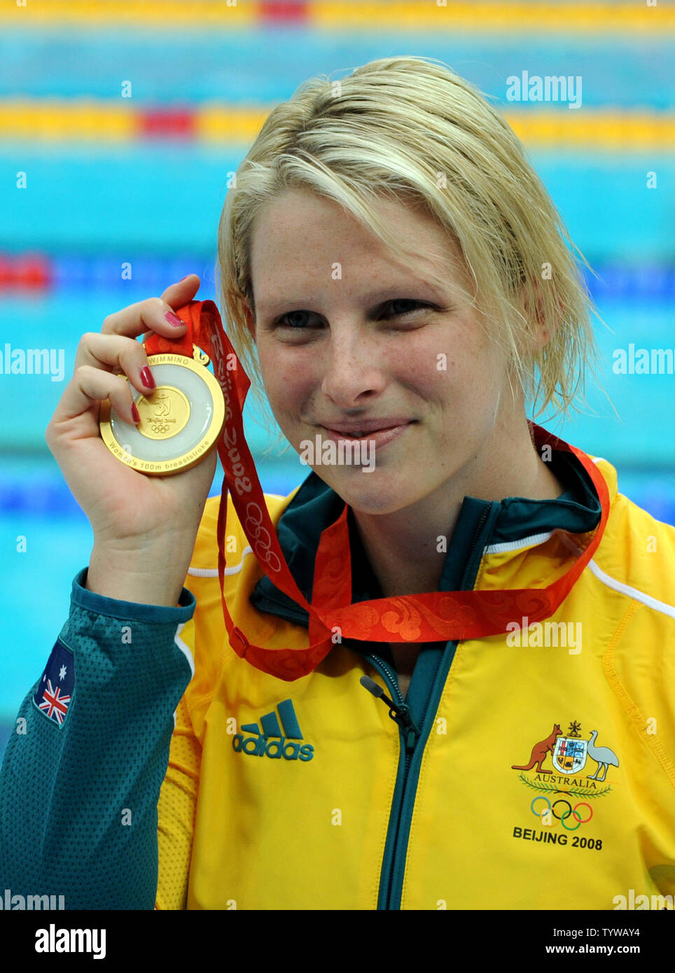 Australia's gold medal winner Leisel Jones shows her medal after the ...