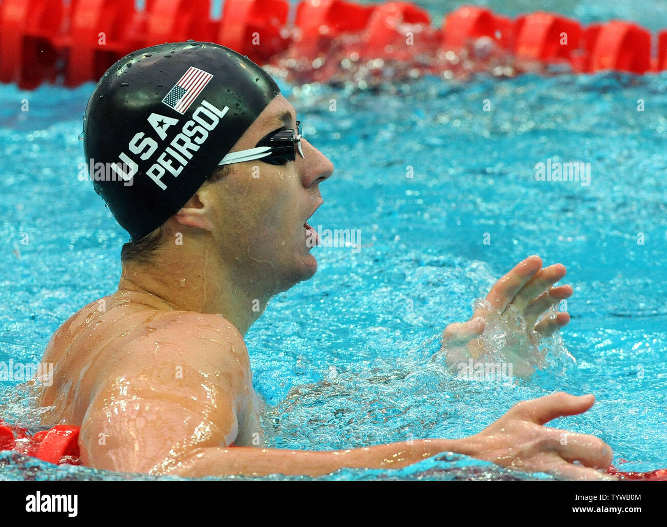 USA's Aaron Peirsol realizes he just set a world record, winning a gold ...