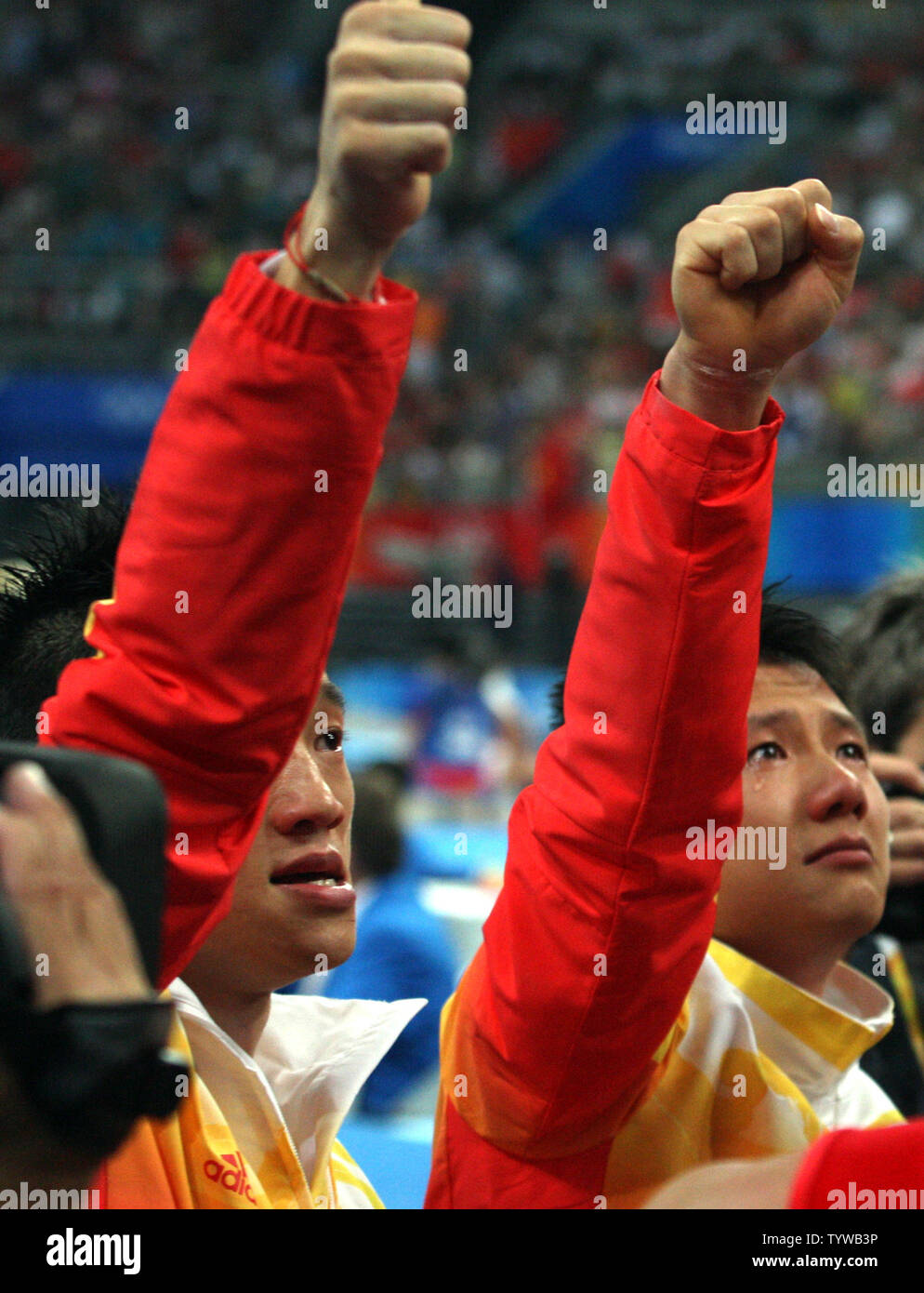 China's men's team jubilates after winning the gold in the Olympic ...