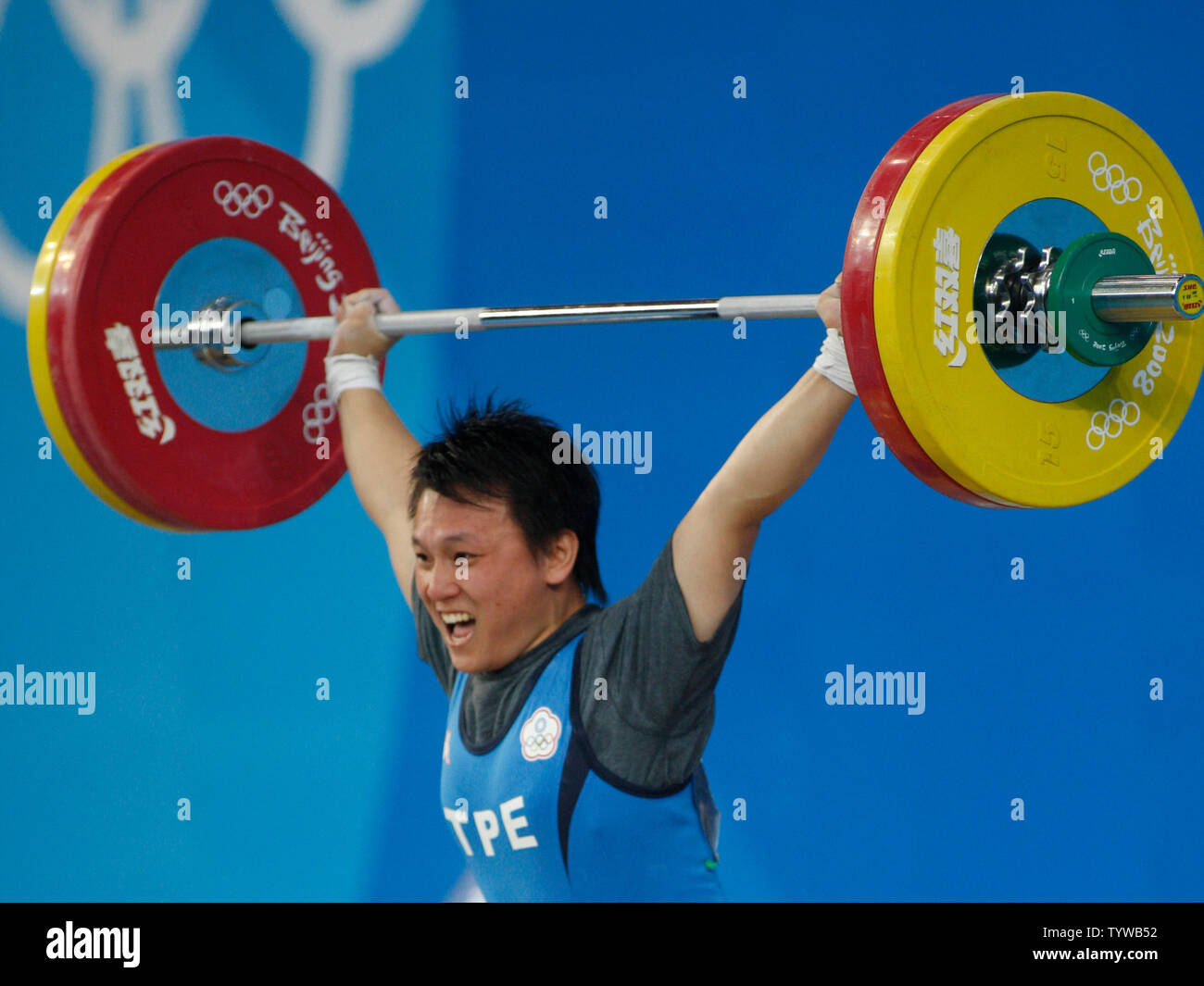 Lu Ying-Chi of Chinese Taipei lifts 116 KG in the Snatch portion of the ...