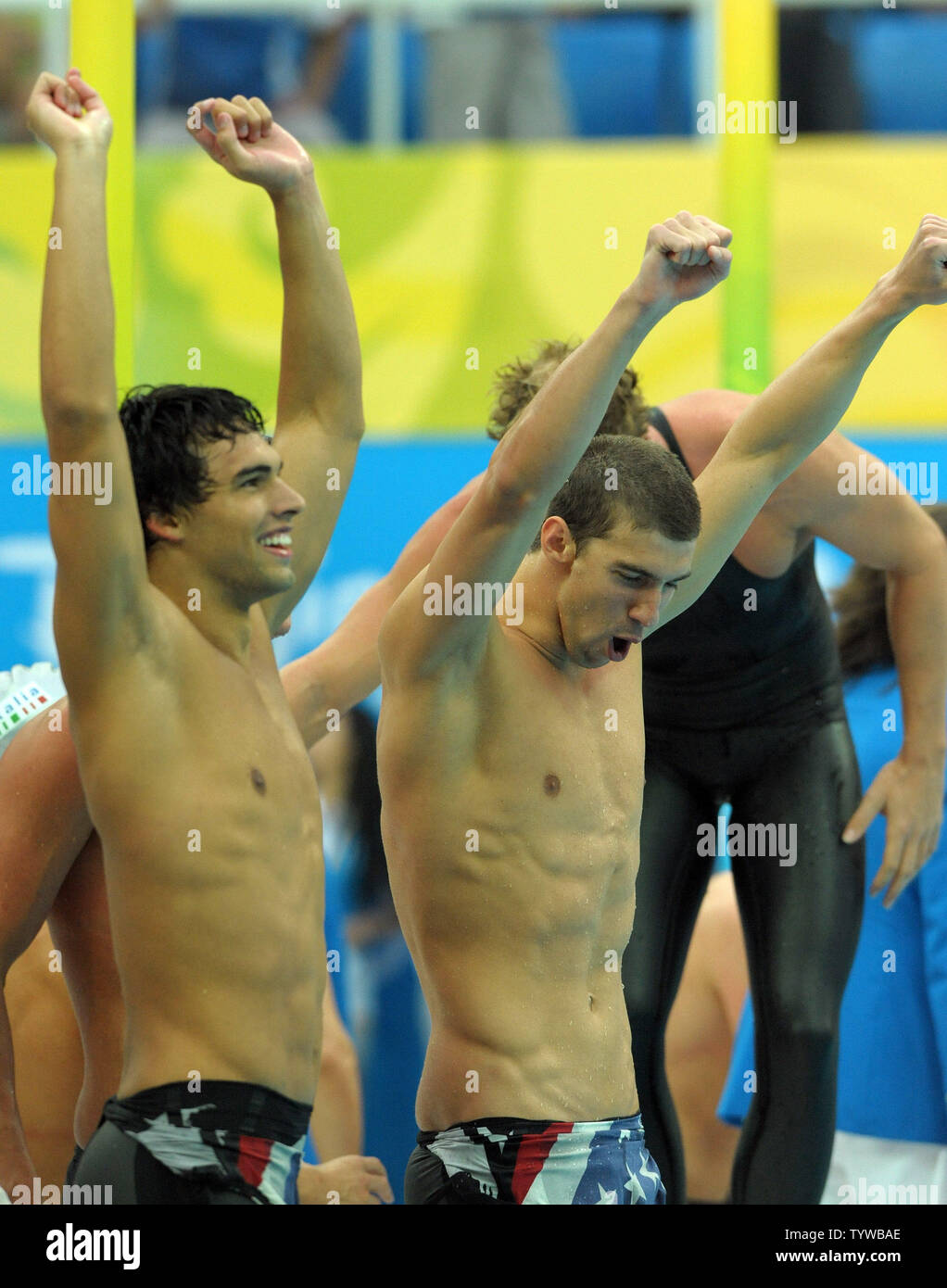 USA's Michael Phelps (R) and Ricky Berens cheer as their team takes ...