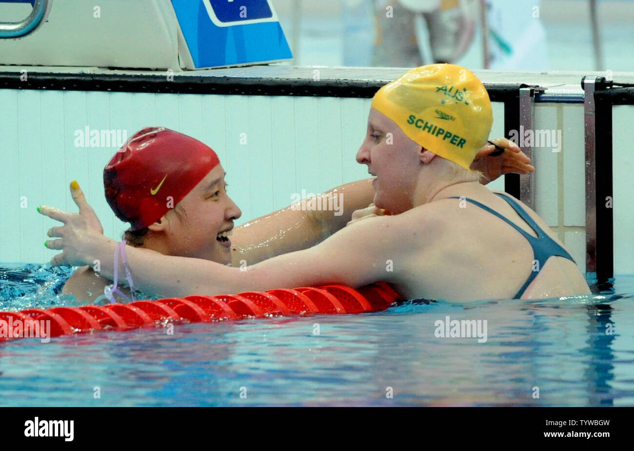 China's Zige Liu hugs Australia's Jessicah Schipper (R) after Liu won ...