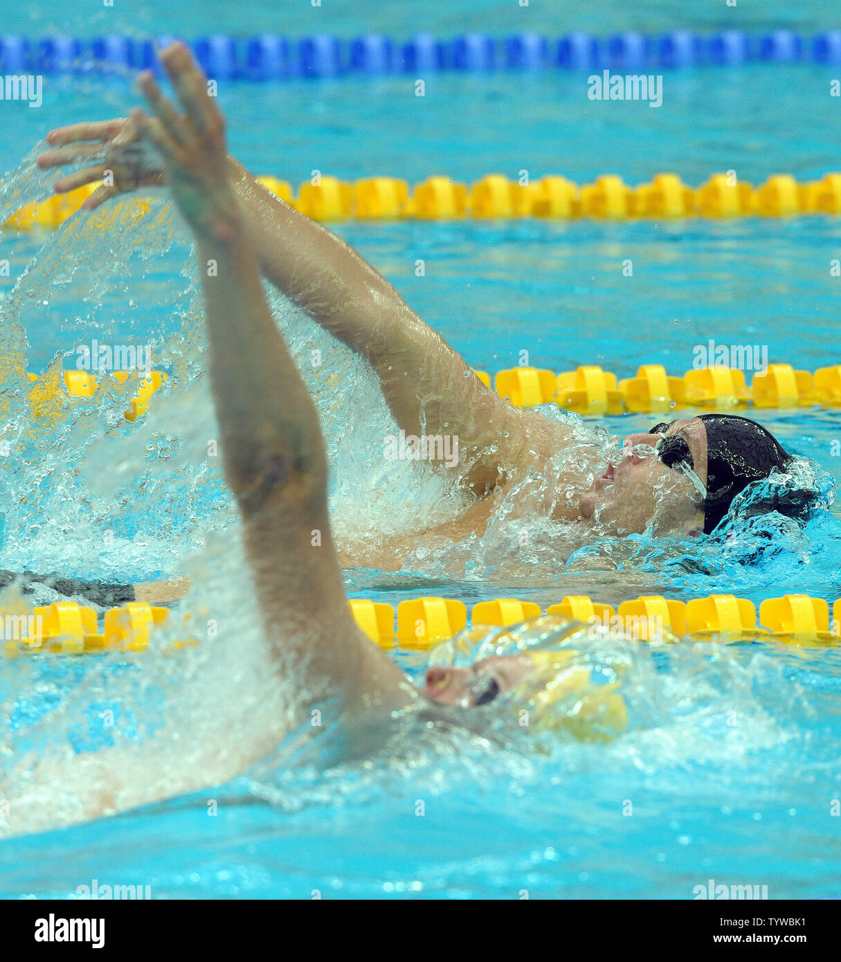 USA's Aaron Peirsol (top) and Australia's Hayden Stoeckel compete in ...