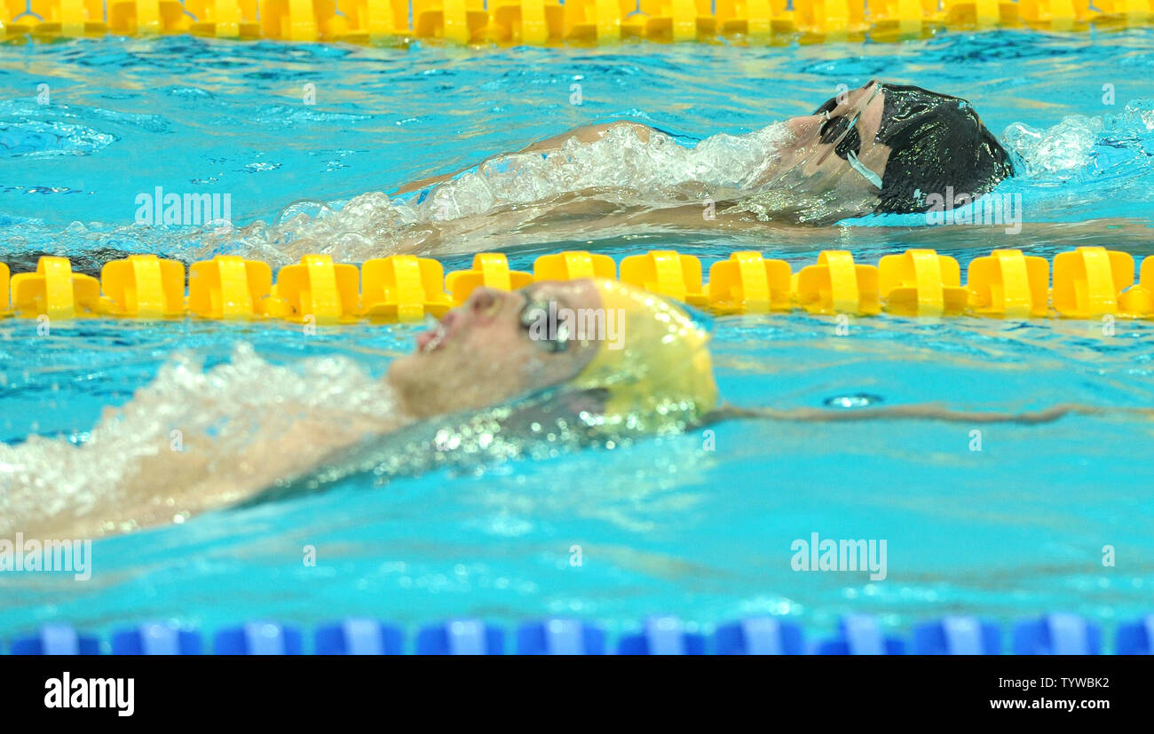 USA's Aaron Peirsol (top) and Australia's Hayden Stoeckel compete in ...