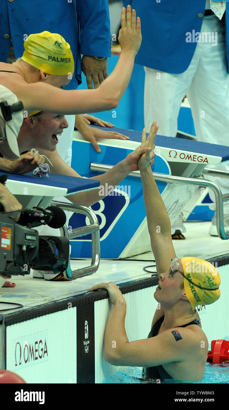 Australia's Linda MacKenzie (R), Kylie Palmer (L) and Bronte Barratt celebrate their world ...