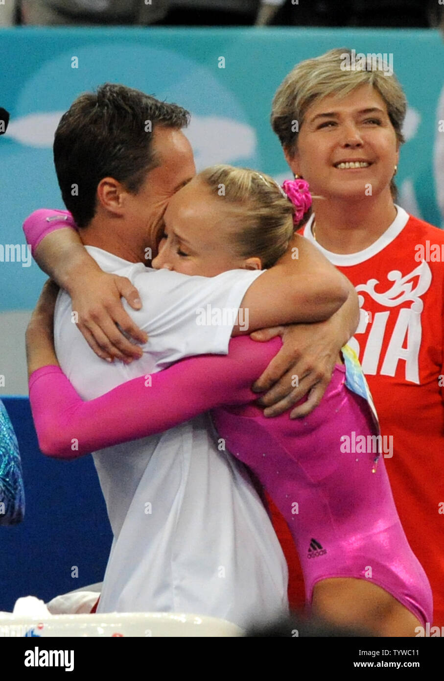 USA's Nastia Liukin is hugged by her father and coach Valeri after it ...