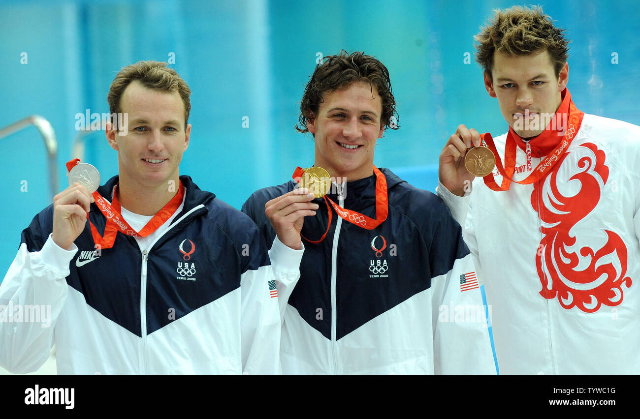 USA's Aaron Peirsol (silver), Ryan Lochte (gold) and Russia's Arkady ...