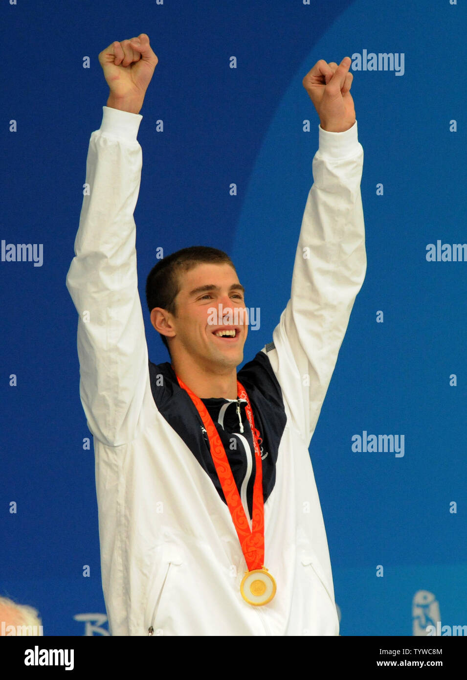 USA's Michael Phelps smiles as he receives his seventh gold medal of ...