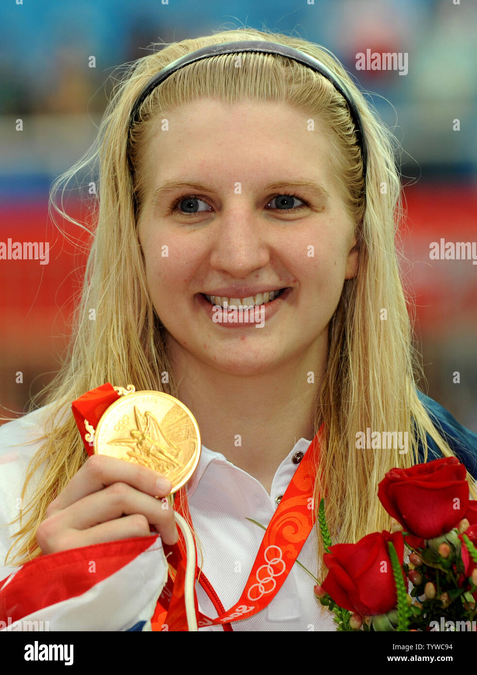 Britains Rebecca Adlington Holds Her Gold Medal During The Awards