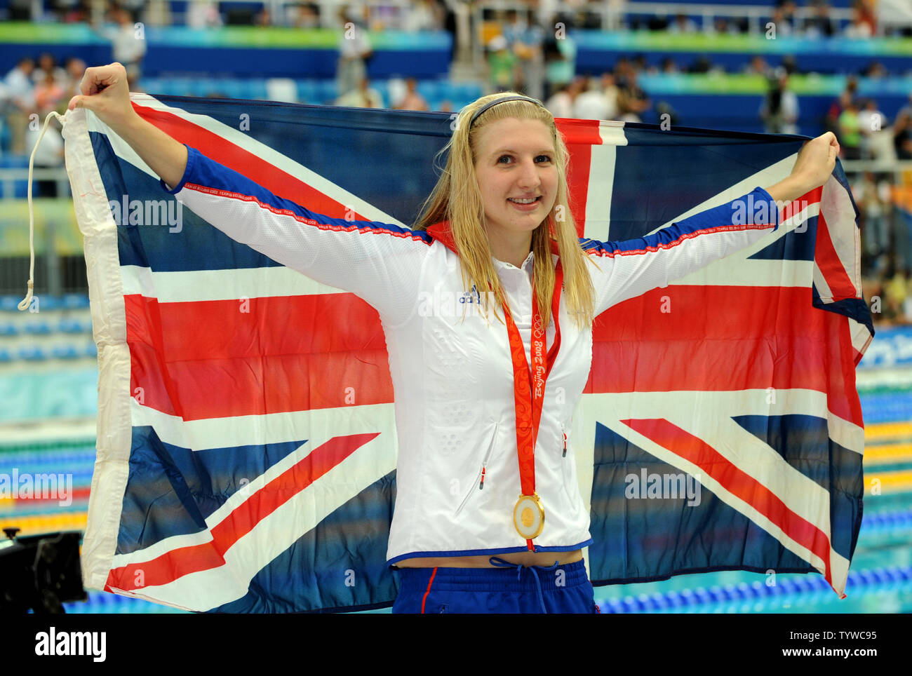 Britains Rebecca Adlington Holds A British Flag As She Walks With Her