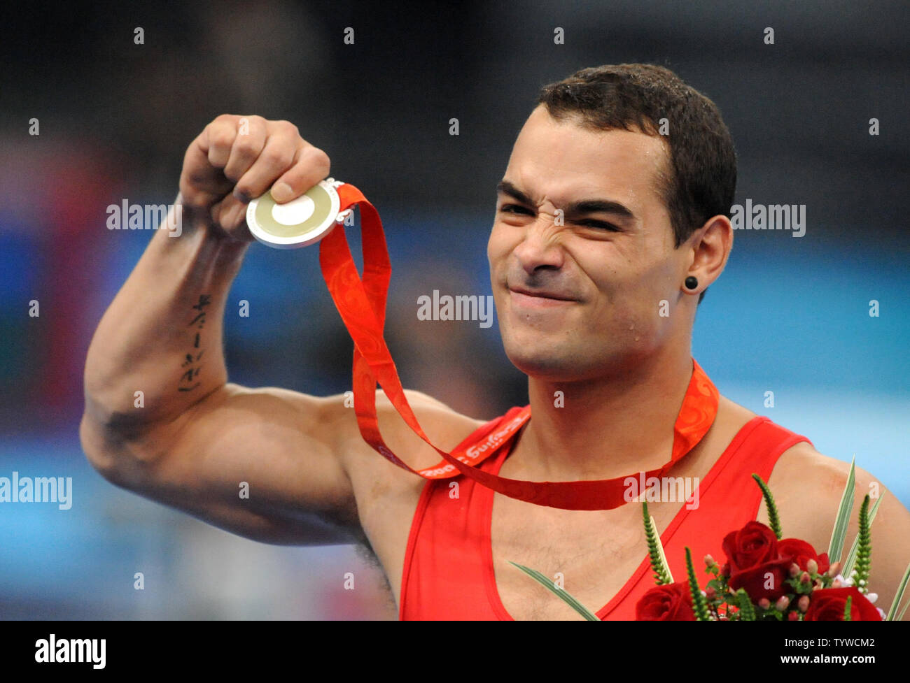 Spain's Gervasio Deferr shows his silver medal at the awards ceremony ...
