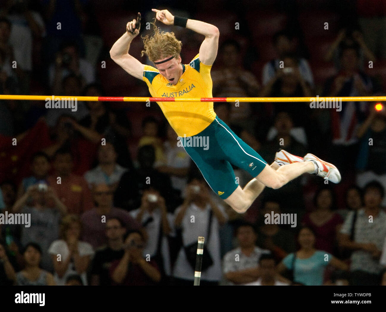 Australia's Steve Hooker clears 5.96 (19-6 1/2) after clinching the gold medal, beating the ...