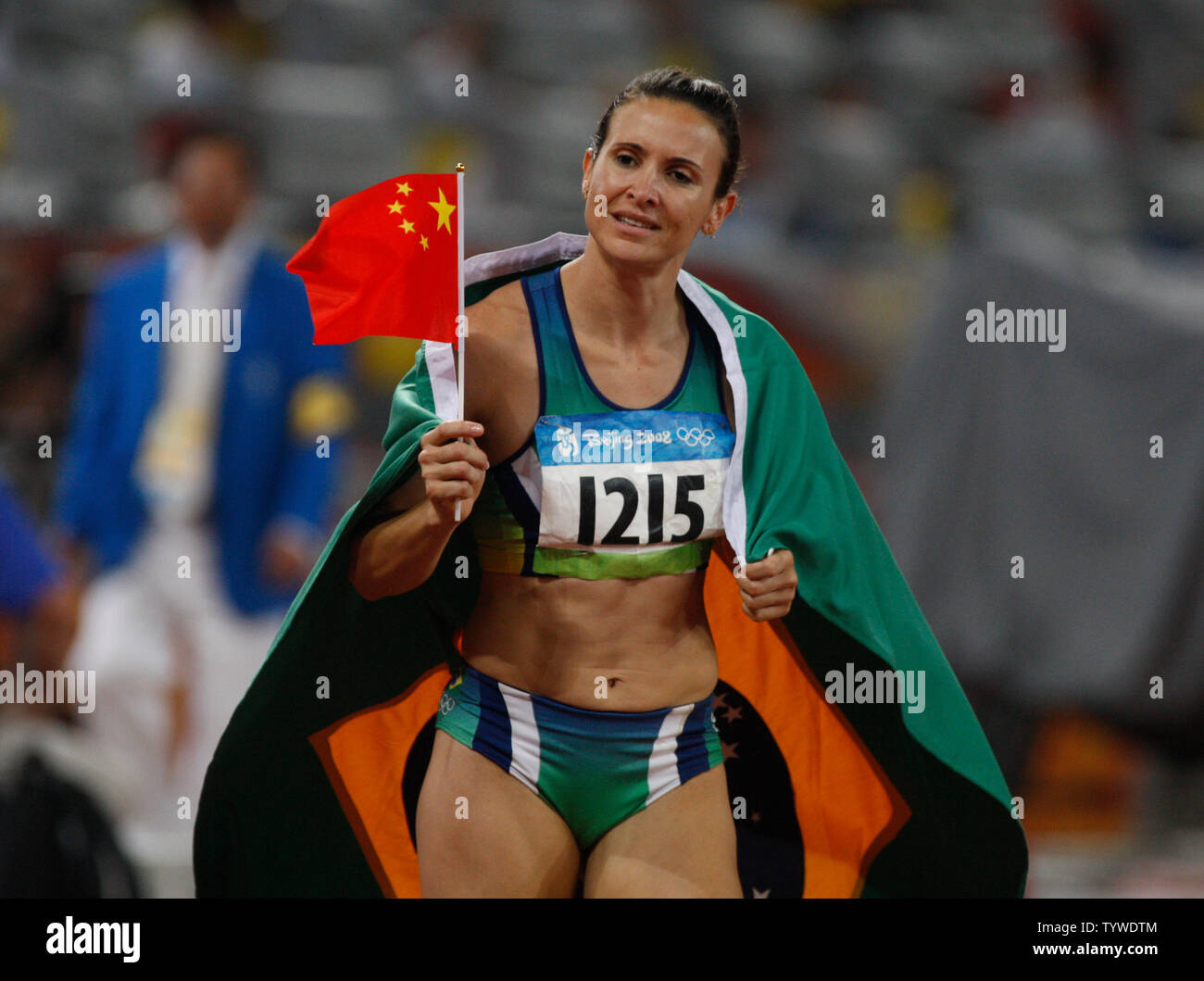 Maurren Higa Maggi of Brazil (1215) celebrates a 7.04m in the women's ...