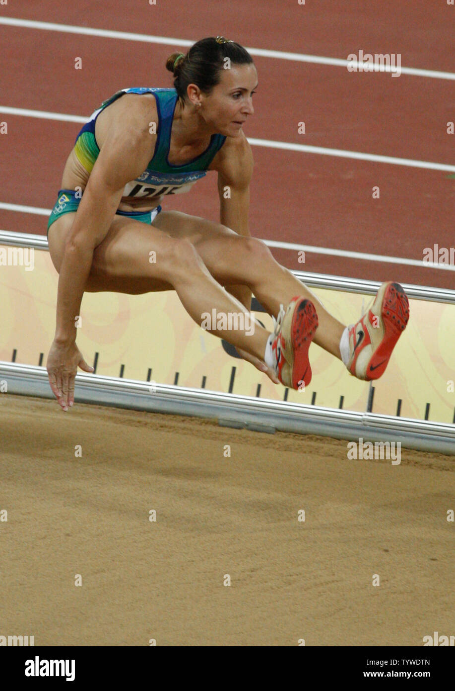 Maurren Higa Maggi of Brazil (1215) jumps 7.04m in the women's long ...