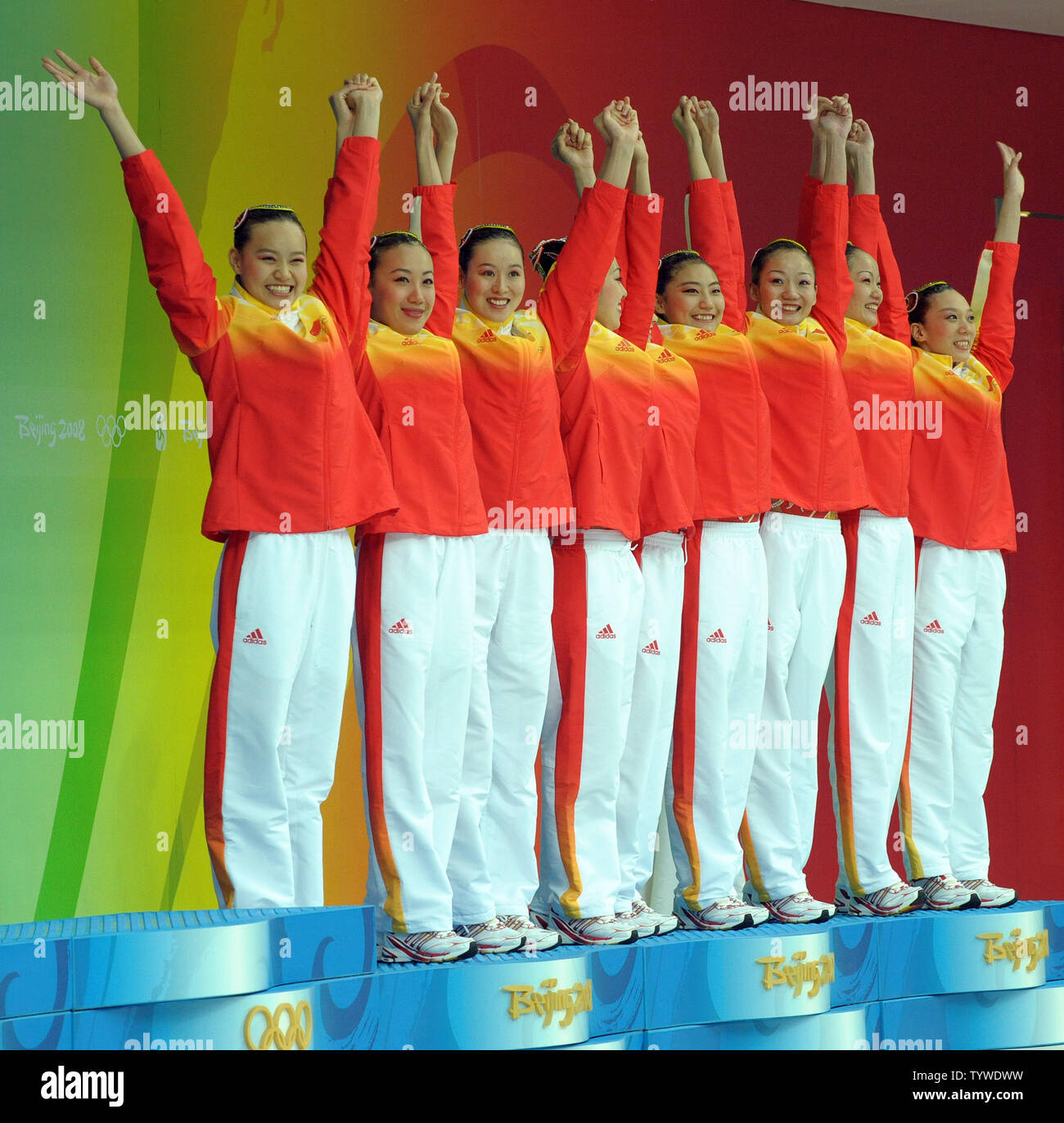 The Chinese Synchronized Swimming team celebrates their bronze medal ...