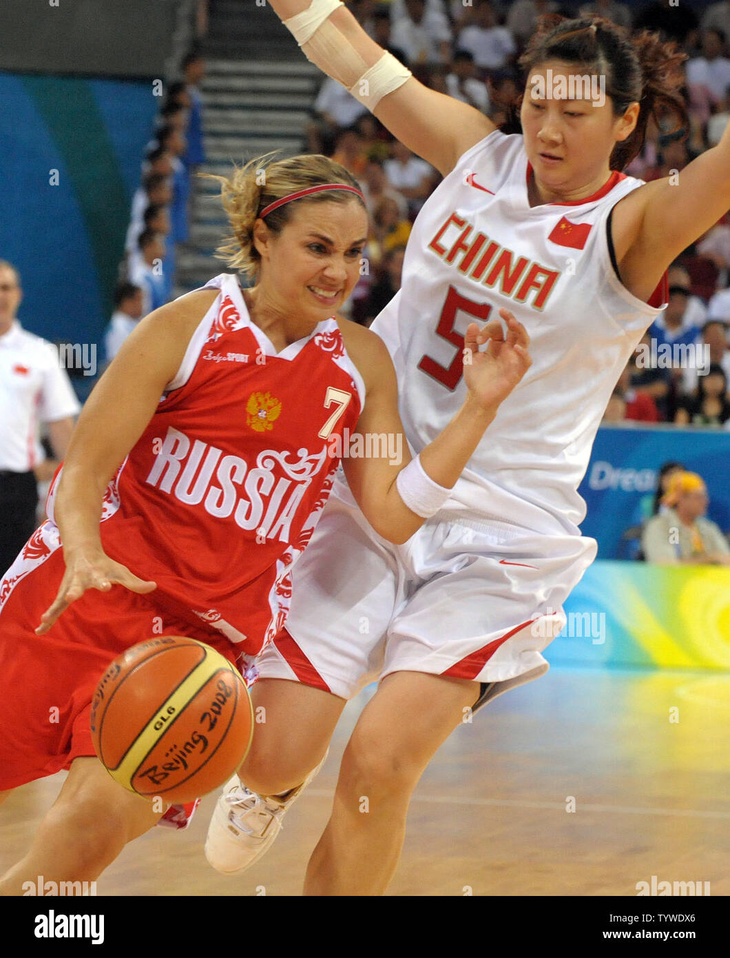 Russia's Rebekka Linn Hammon drives past China's Bian Lan in the fourth quarter of the bronze ...