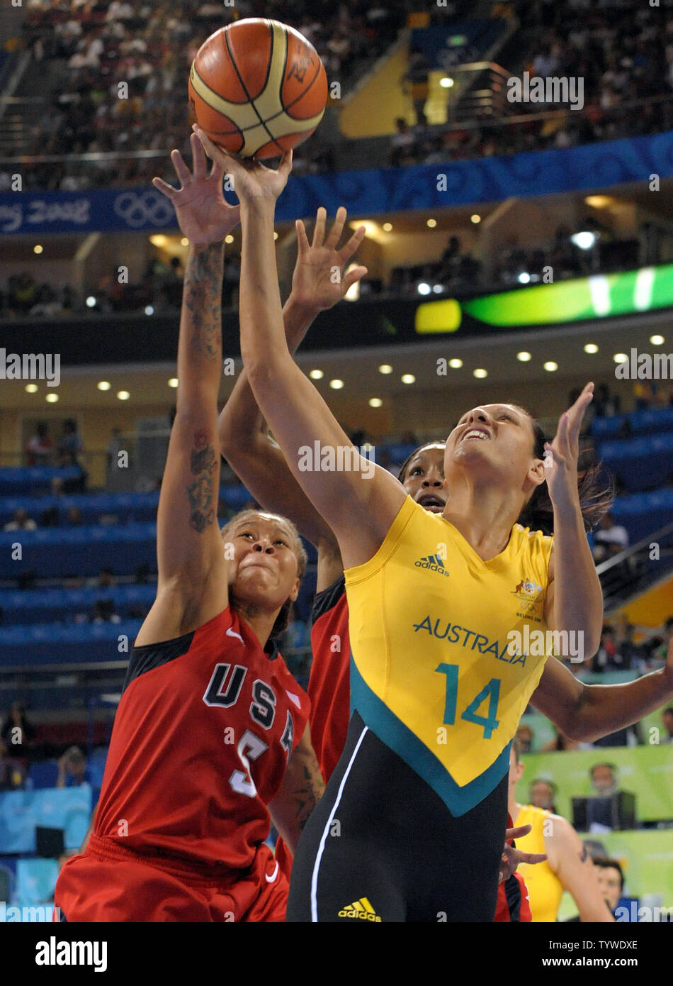 Australia's Rohanee Cox shoots over USA's Seimone Augustus in the ...