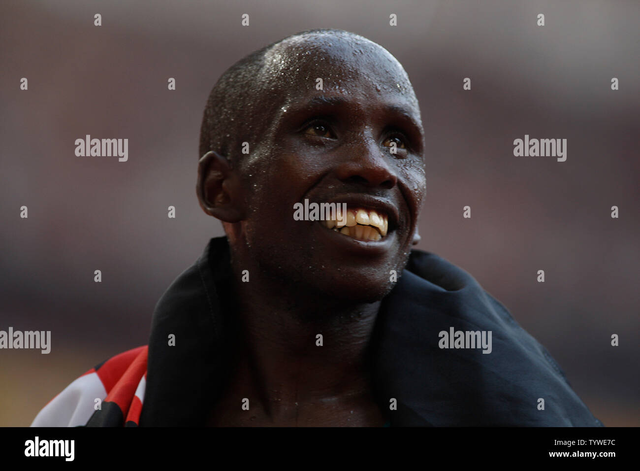 Samuel Kamau Wanjiru of Kenya celebrates winning the men's marathon in ...