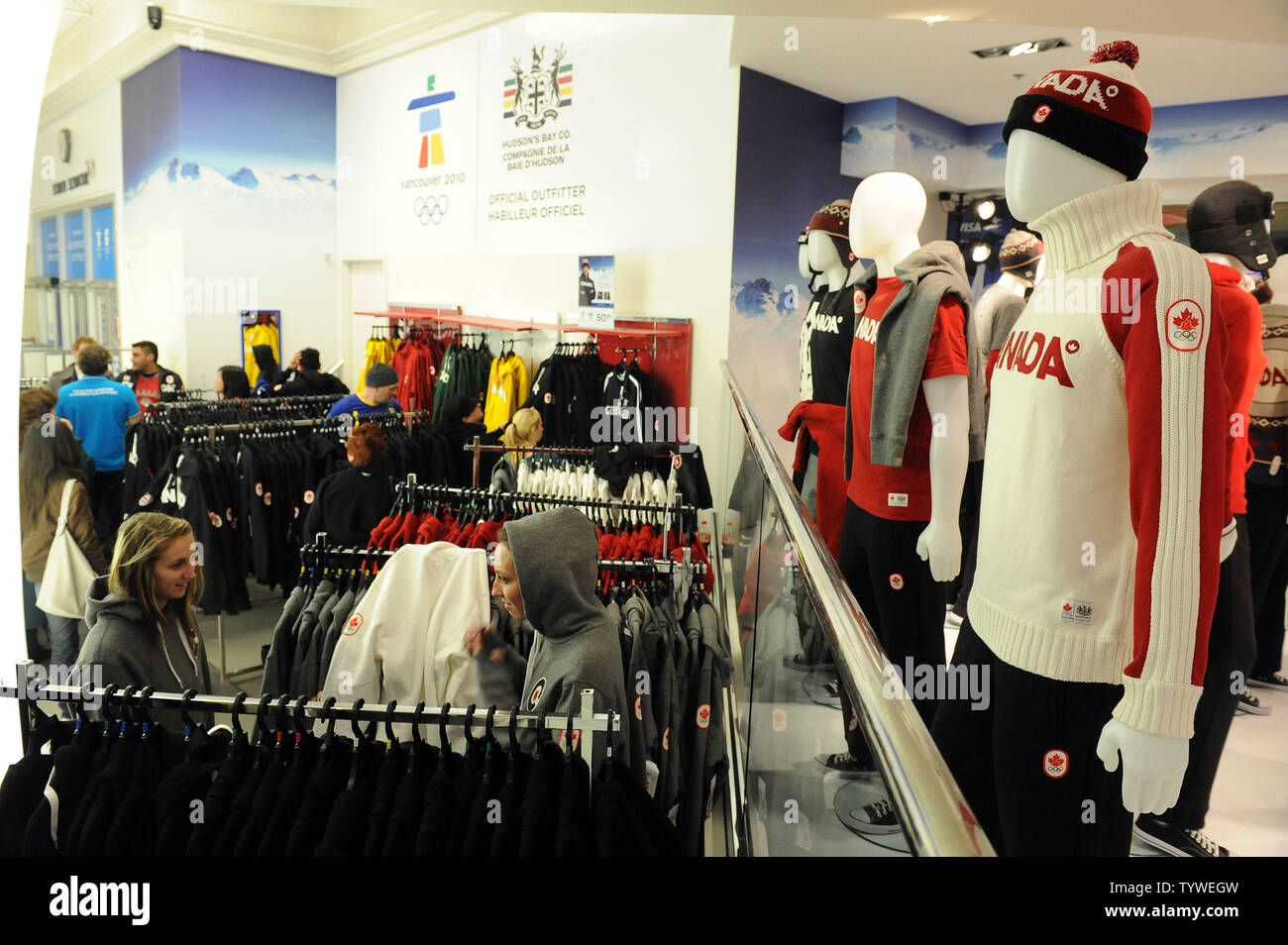 Shoppers browse Olympic merchandise at the Olympic superstore in a ...