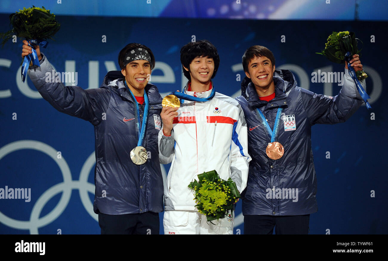 American Apolo Anton Ohno (silver), Korean Jung-Su Lee (gold) and American J.R. Celski (bronze ...