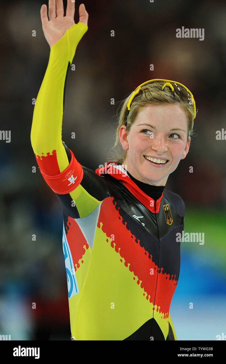 Monique Angermuller of Germany waves to fans after she competes in ...