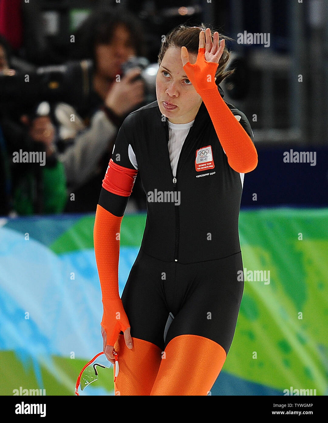 Laurine van Riessen of the Netherlands waves to fans after competing in ...