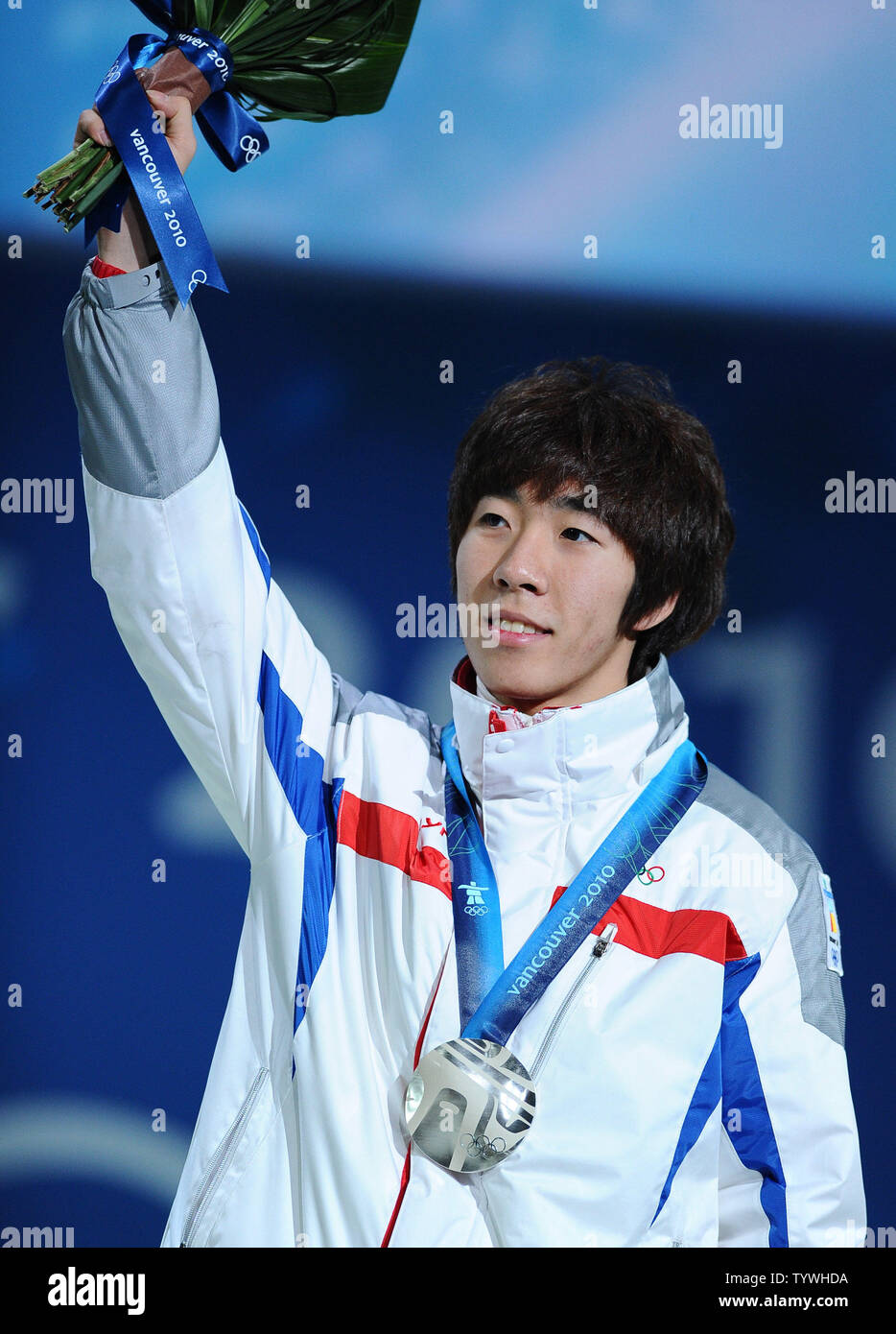 Korea's Ho-suk Lee (silver) celebrates the medal he earned in men's ...