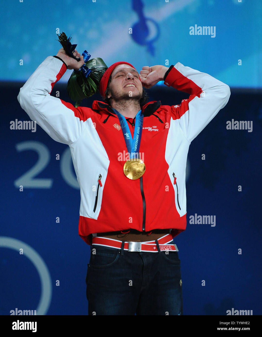 Switzerland's Michael Schmid celebrates the gold medal he earned in men ...