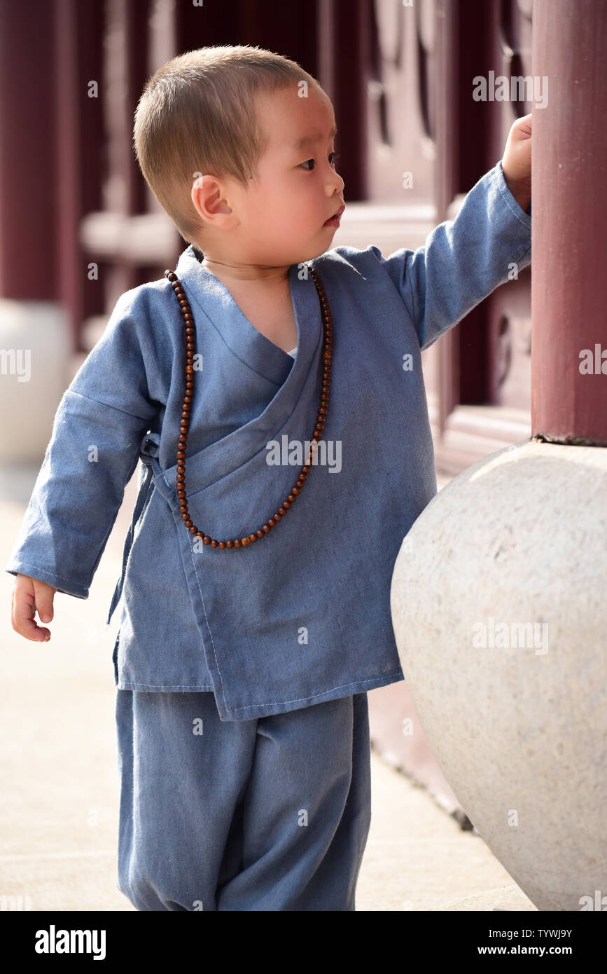 Cute little monk, children's photography Stock Photo - Alamy