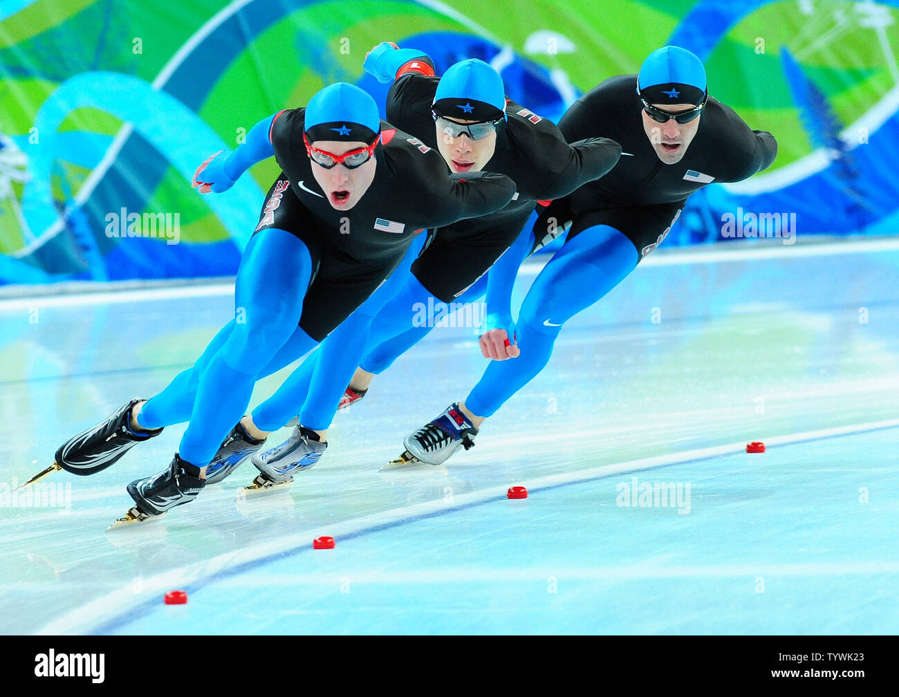 USA's Jonathan Kuck, Brian Hansen and Chad Hedrick, (L to R) skate to a ...