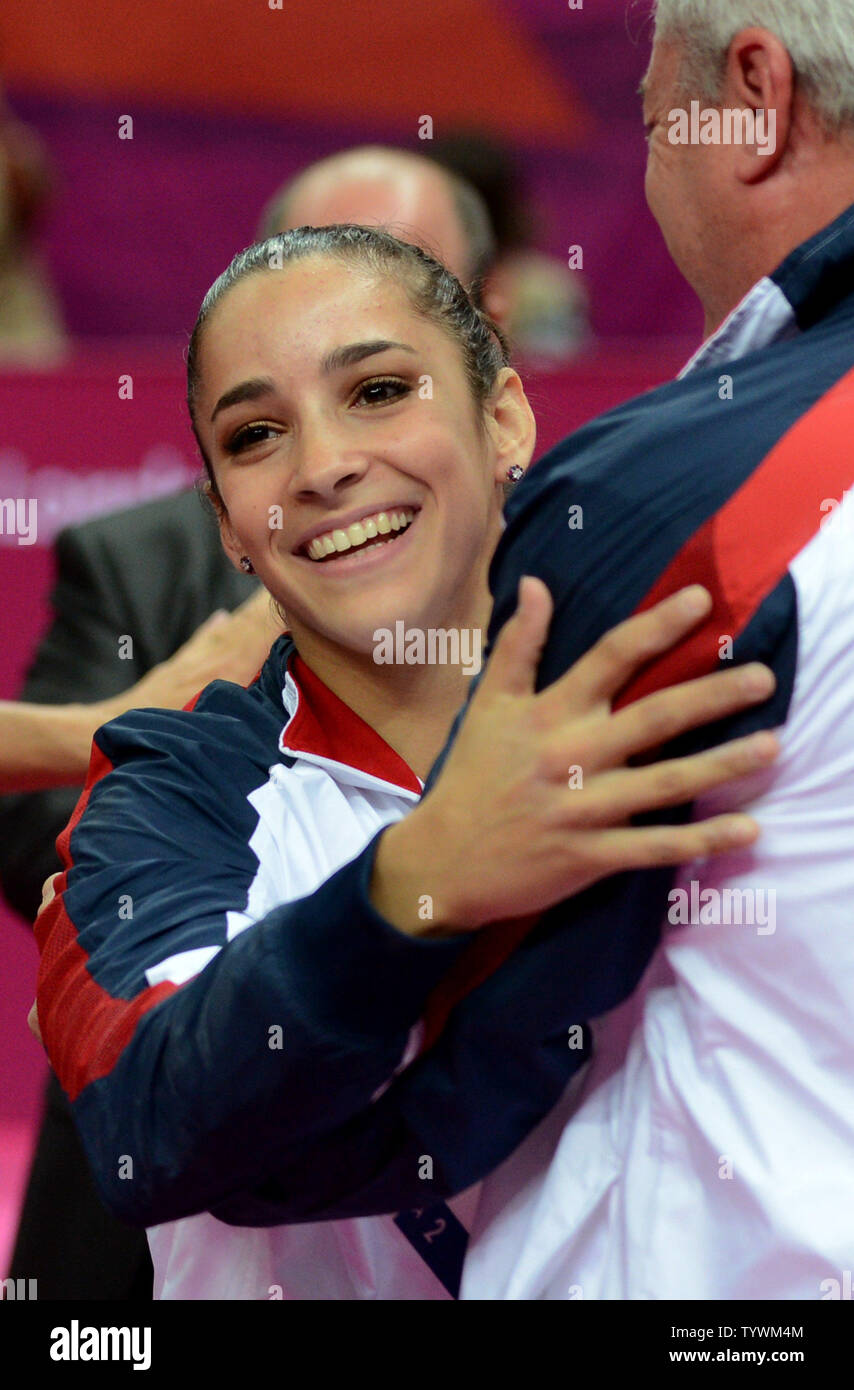 USA's Alexandra Raisman smiles as she hugs her coach after her appeal ...