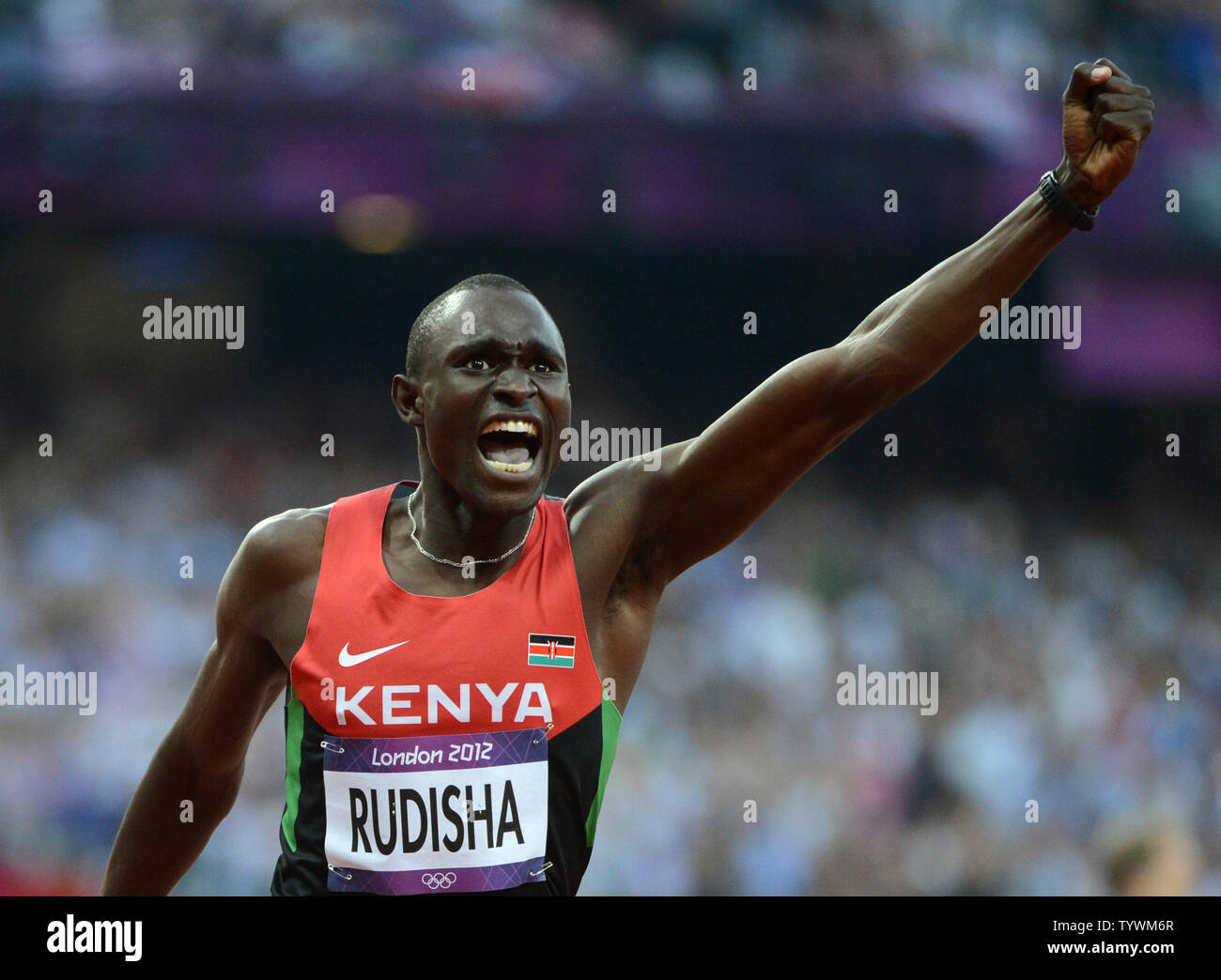 Kenya's David Lekuta Rudisha raises his arms in jubilation as he wins ...
