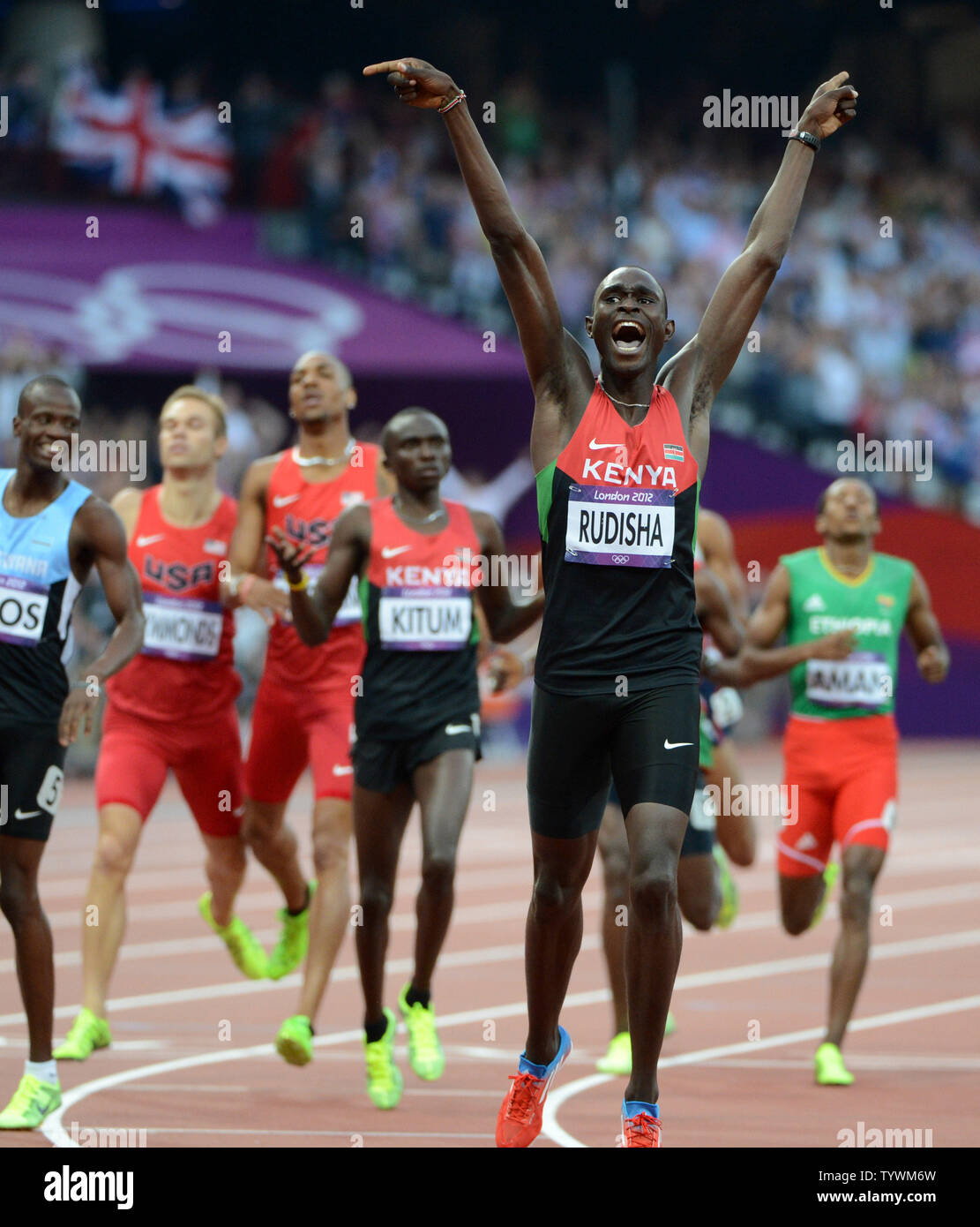 Kenya's David Lekuta Rudisha raises his arms in jubilation as he wins ...