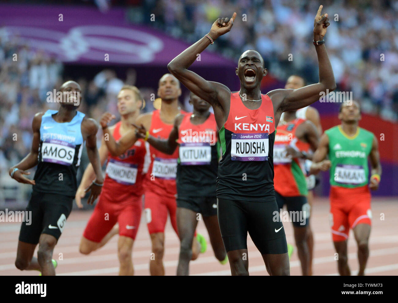 Kenya's David Lekuta Rudisha raises his arms in jubilation as he wins ...