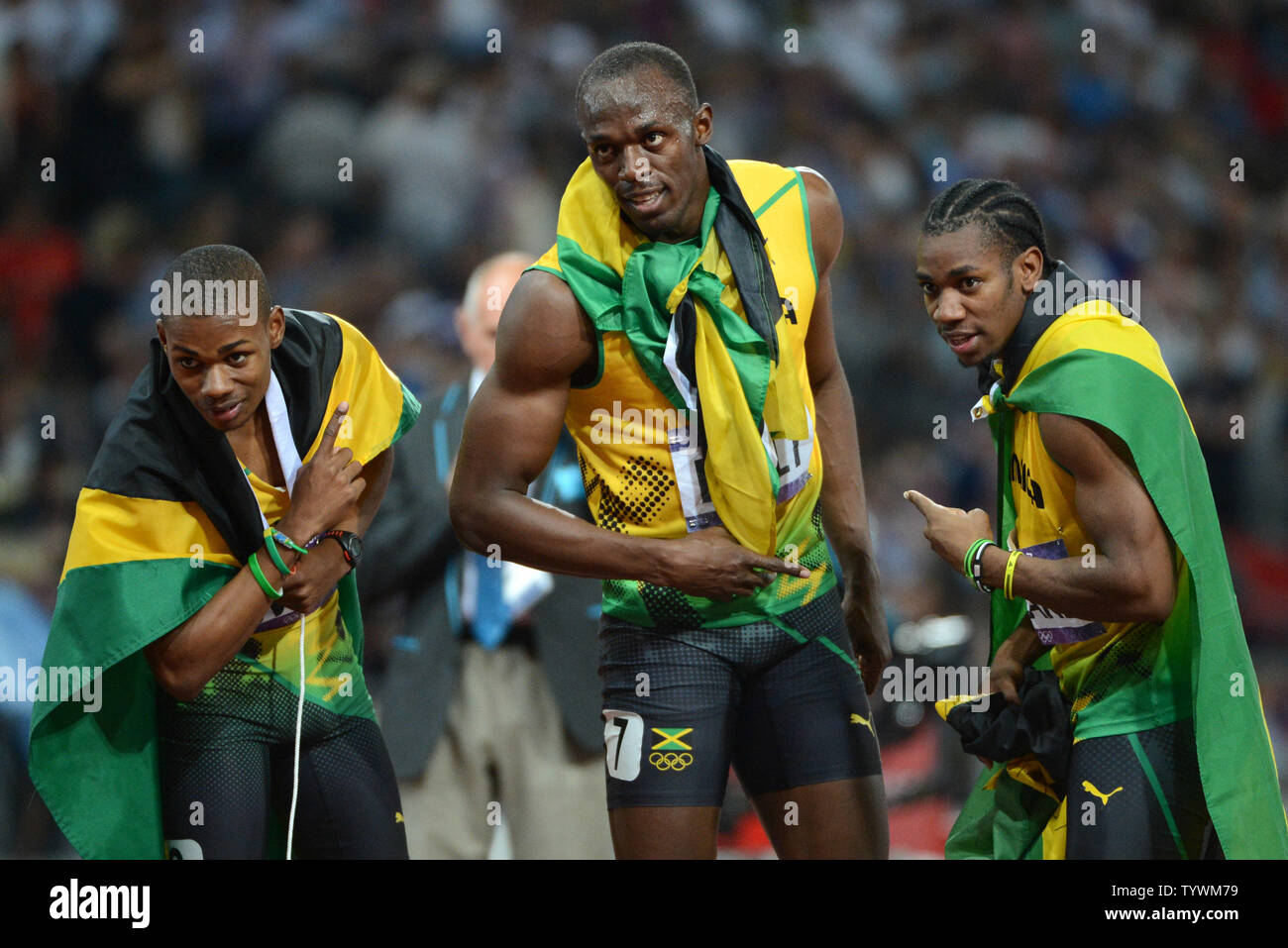 Jamaica's Usain Bolt poses with teammates Yohan Blake (R) and Warren ...
