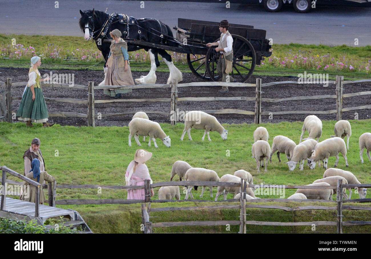 A traditional farming scene is pictured during the Opening Ceremonies ...