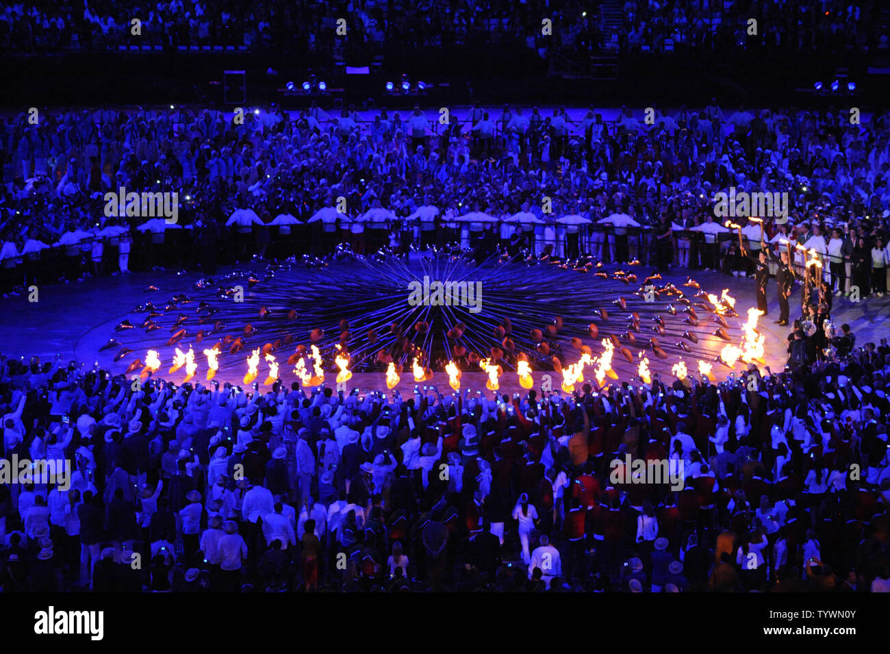 The Olympic Flame is lit during the Opening Ceremony of the London 2012 ...