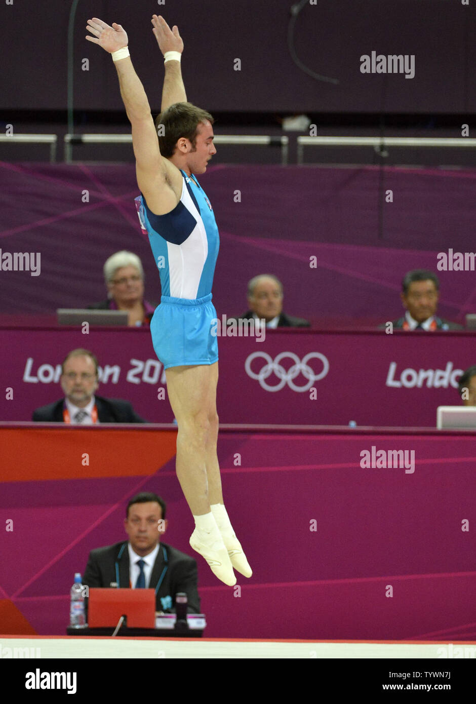 Chile's Tomas Gonzalez is airborne as he performs his routine during ...