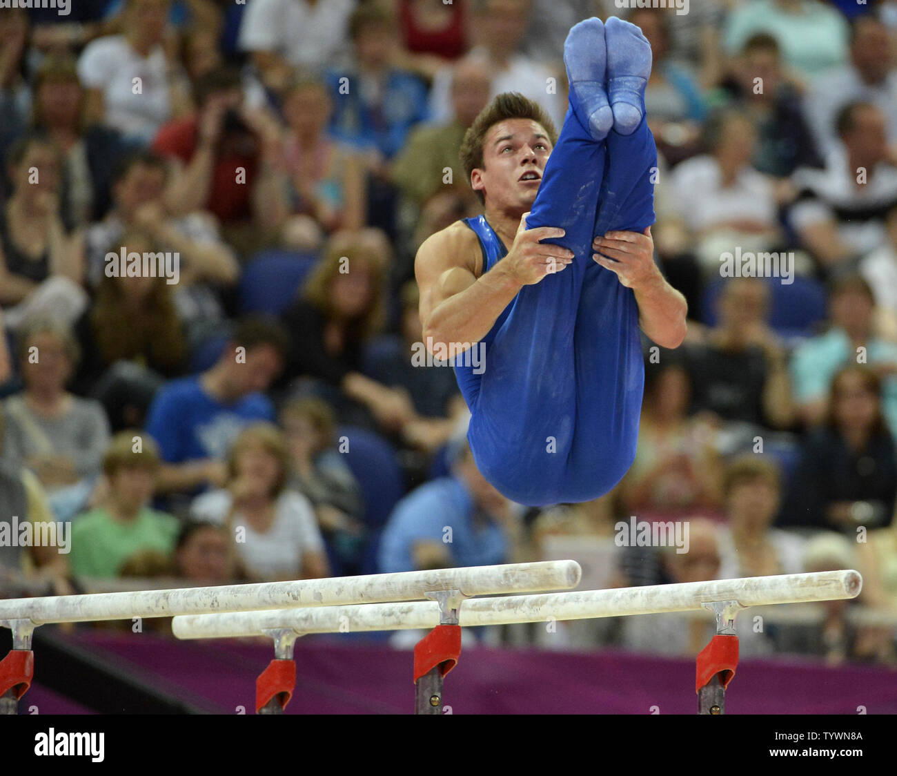American gold medal hopeful Samuel Mikulak performs his routine on the ...