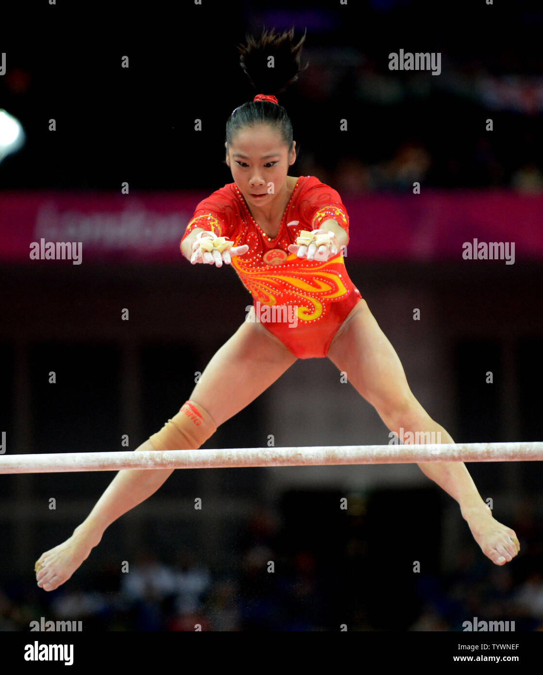 China's Deng Linlin practices her routine on the Uneven Bars during the ...