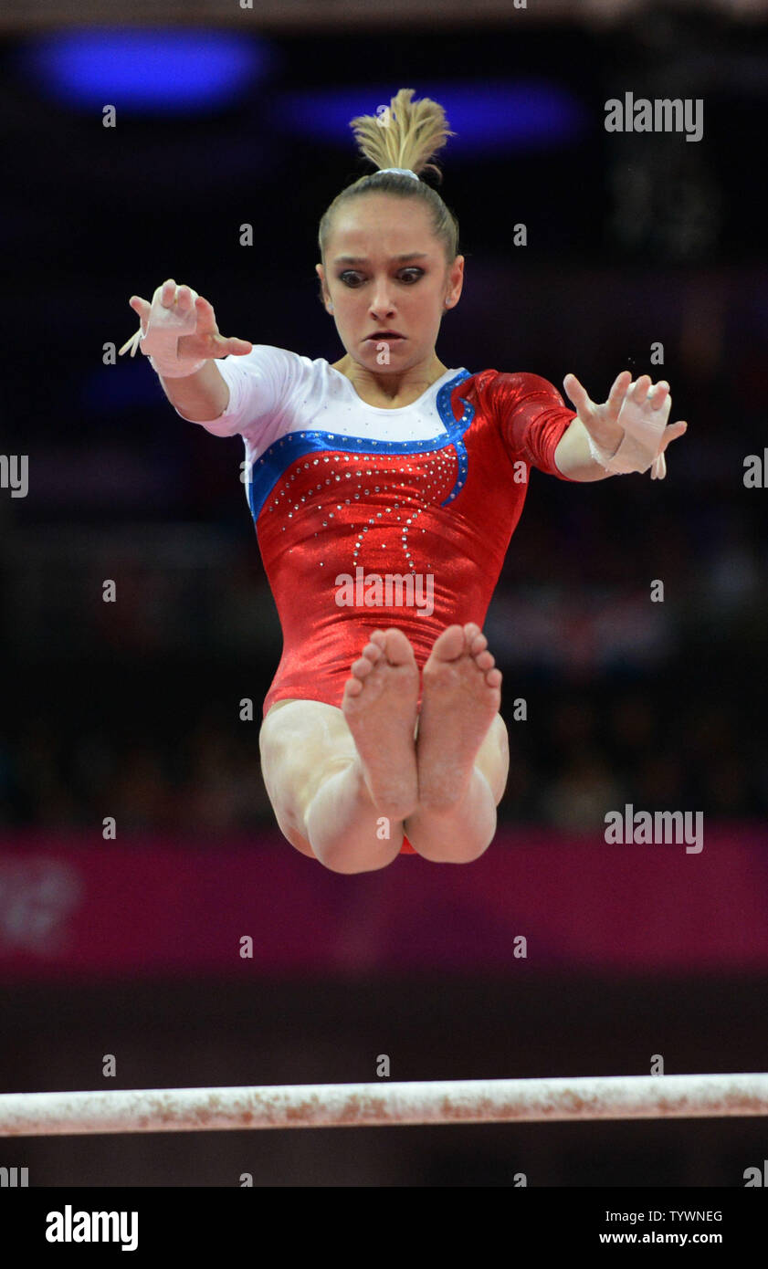 Russias Victoria Komova Performs Her Routine On The Uneven Bars During