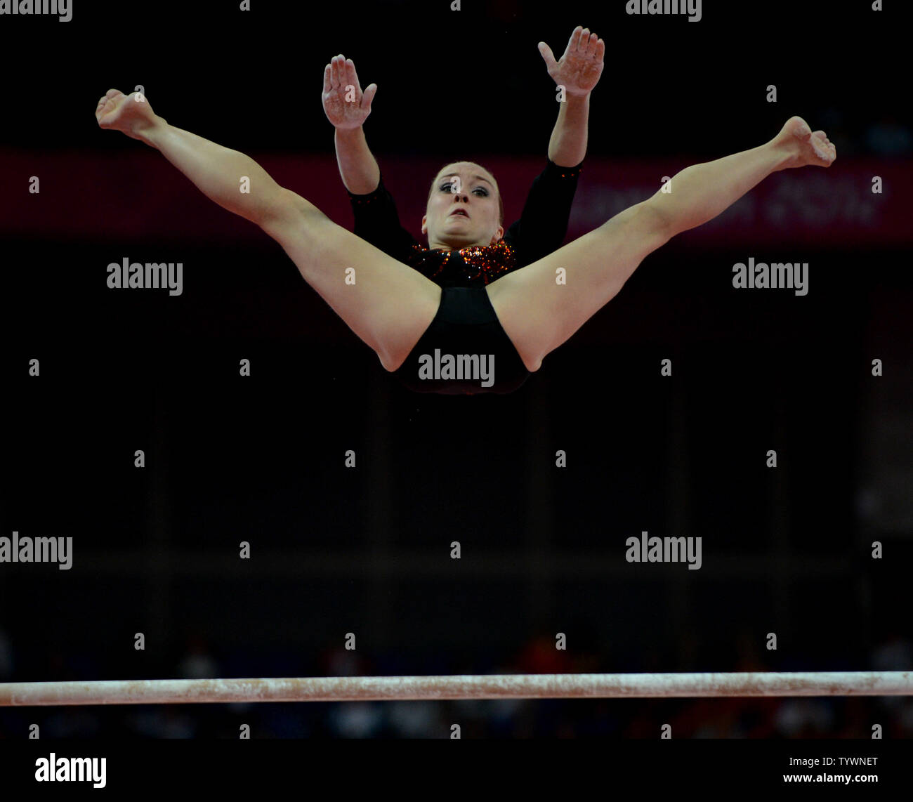 Netherland's Celine van Gerner performs her routine on the Uneven Bars ...