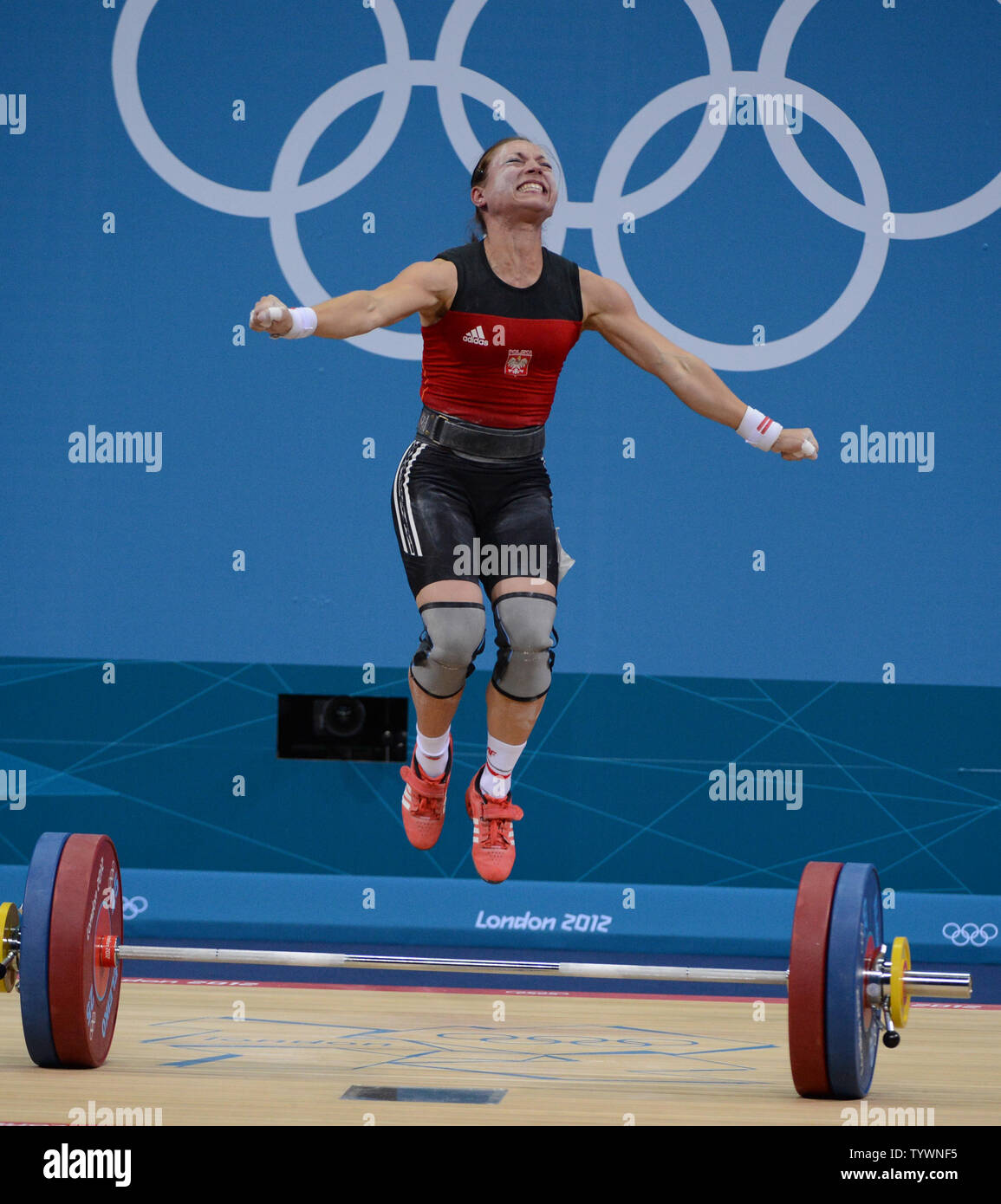 Joanna Lochowska reacts to her lift in the women's 53KG weightlifting ...