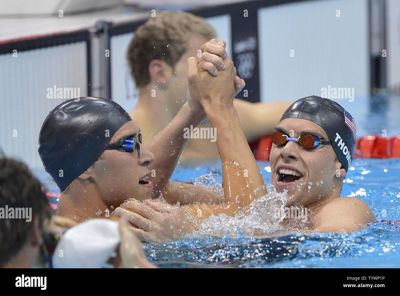 Gold Medalist Matthew Grevers of the United States (L) and teammate and ...