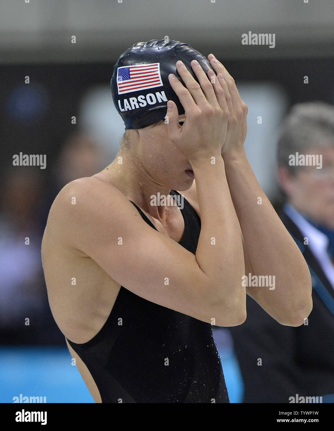 Breeja Larson of the United States adjusts her goggles after a false ...