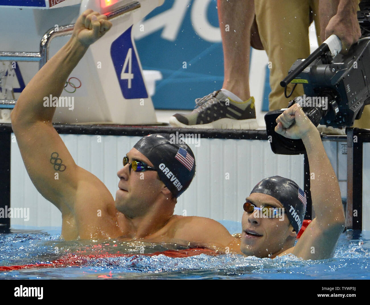 American swimmers Matthew Grevers (L) and Nick Thoman in jubilation ...